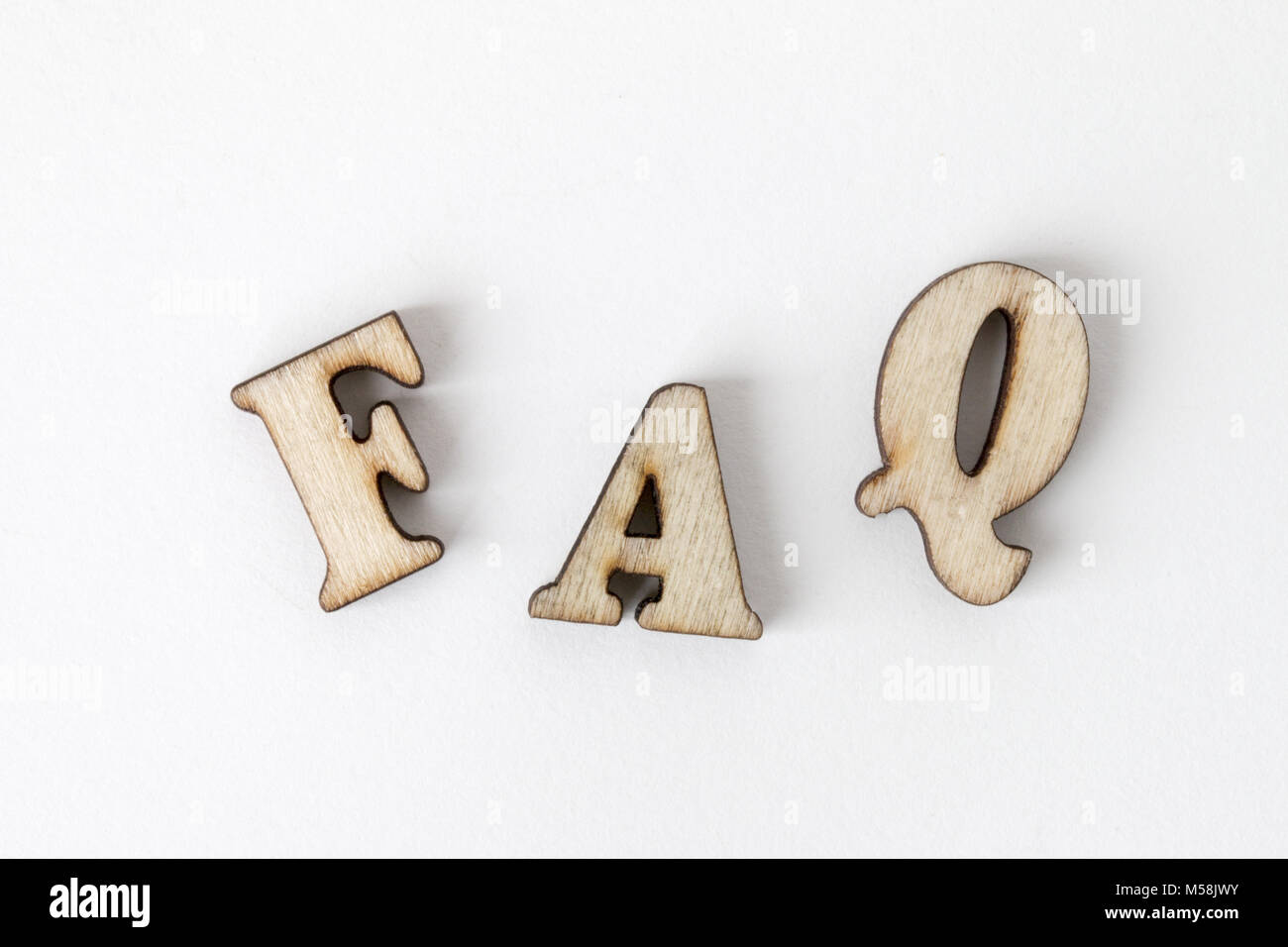 FAQ,Alphabet made with wooden board.Frequently Asked Questions Stock ...