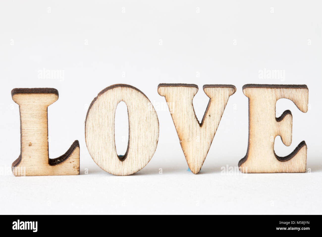 Love, Wood letters LOVE on White background Stock Photo - Alamy