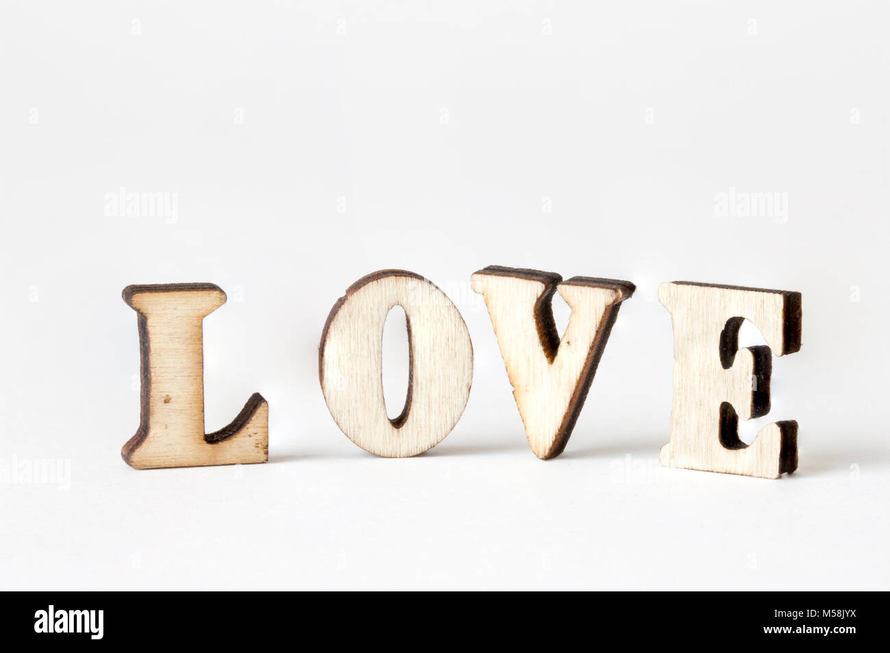 Love, Wood letters LOVE on White background Stock Photo - Alamy
