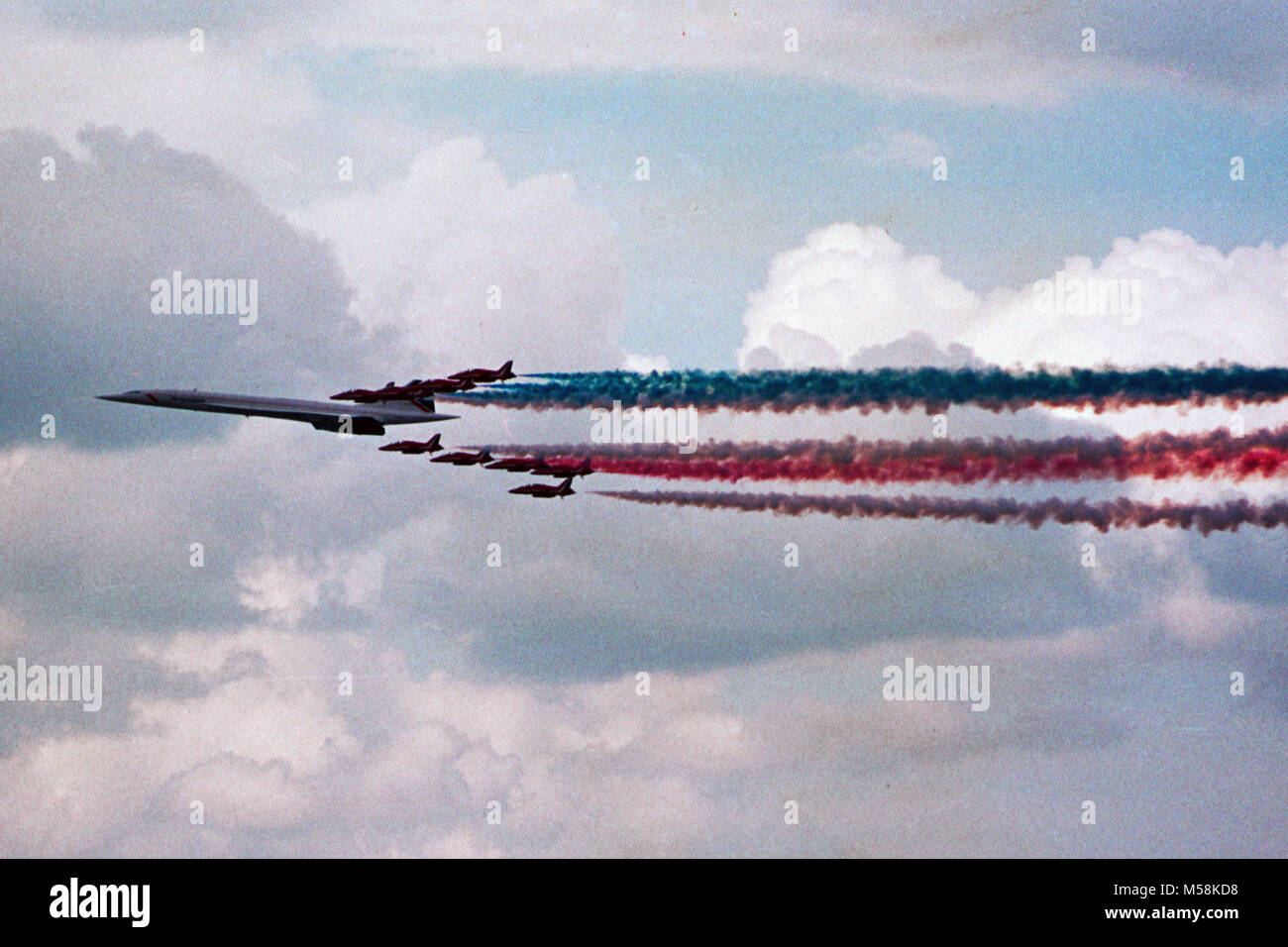 A British Airways Concorde and RAF Red Arrows fly over Heathrow to ...