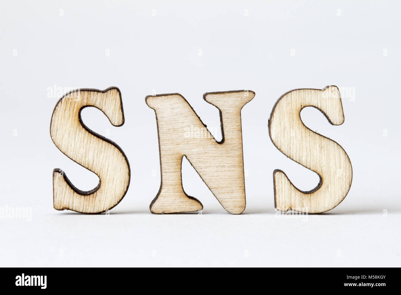 SNS, Wood letters SNS Stock Photo - Alamy