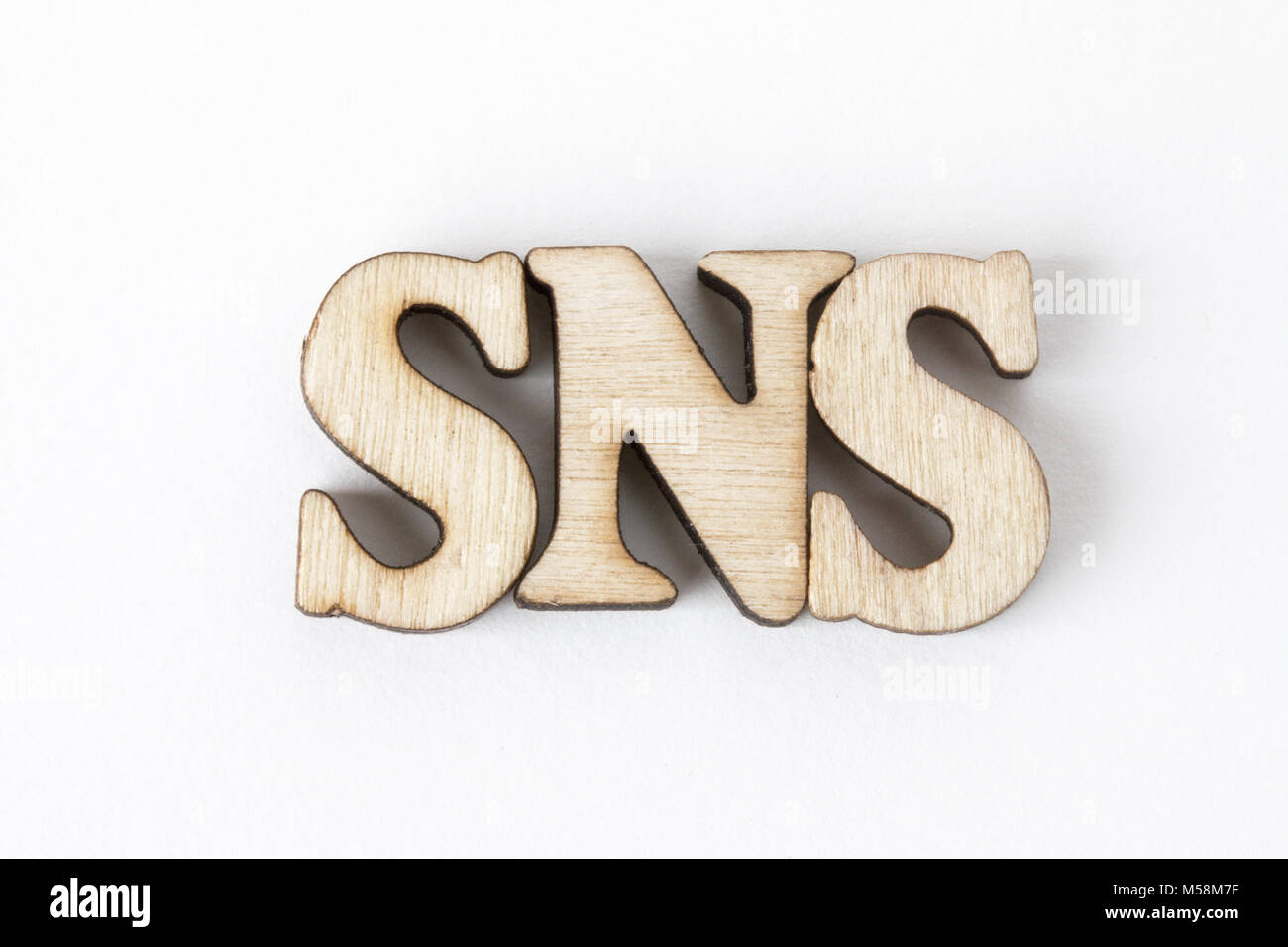 SNS, Wood letters SNS on White background Stock Photo - Alamy