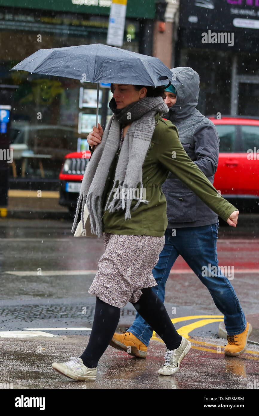 People out and about as light snow and sleet falls in London Featuring ...