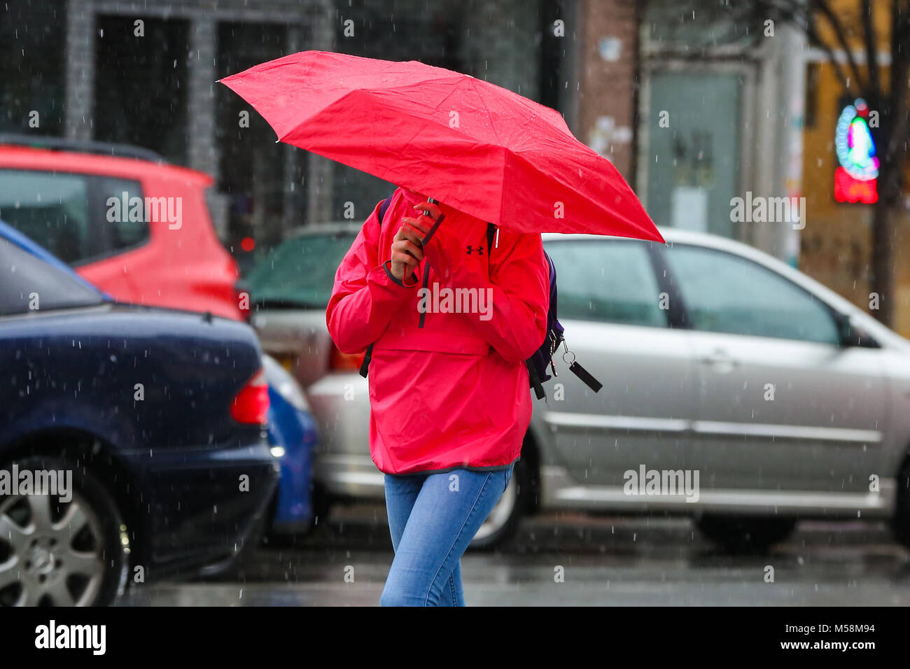 People out and about as light snow and sleet falls in London Featuring ...