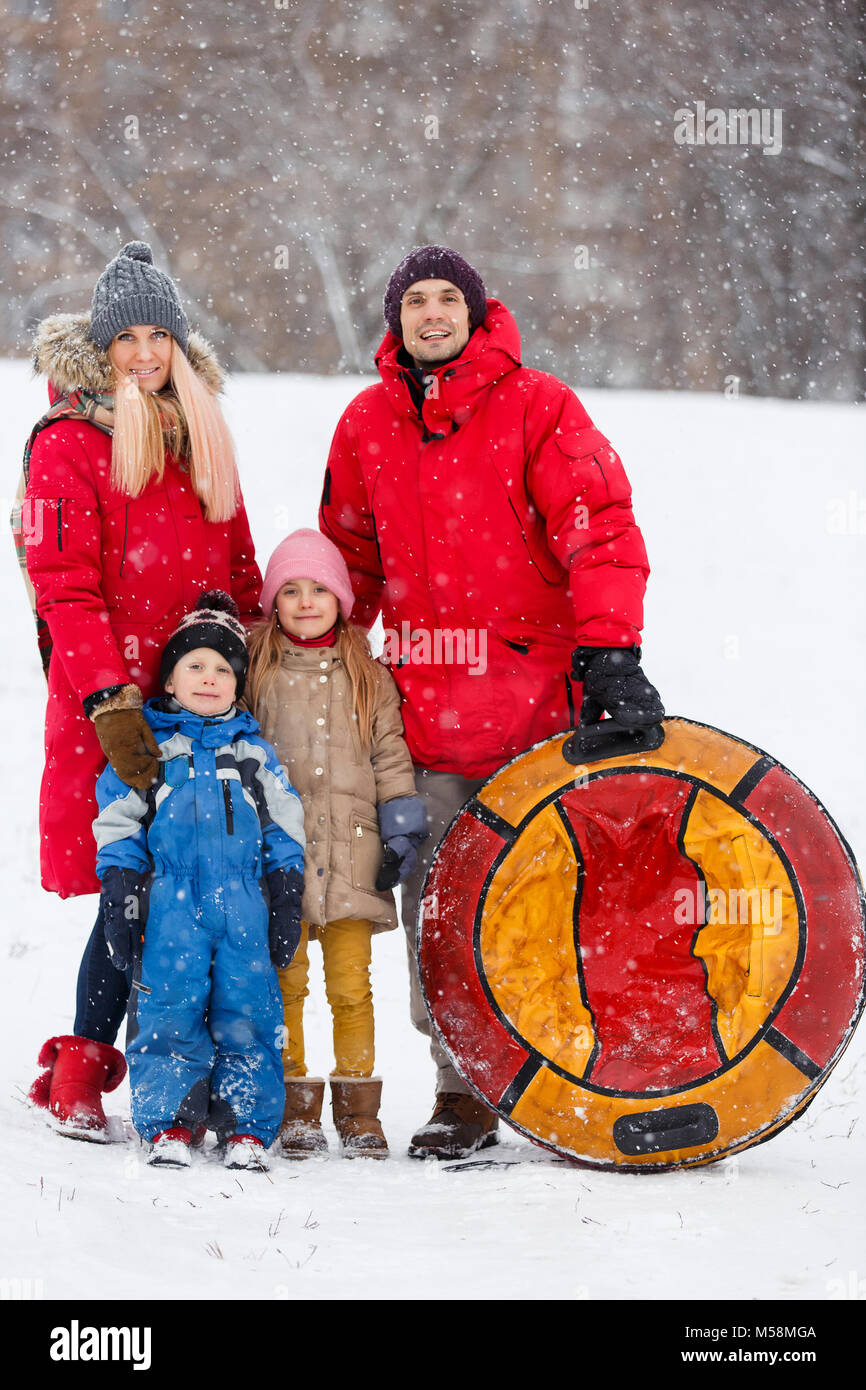 Couple snow tubing hi-res stock photography and images - Alamy