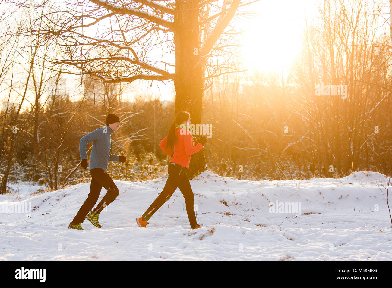 Picture of sports man and woman on morning run Stock Photo - Alamy