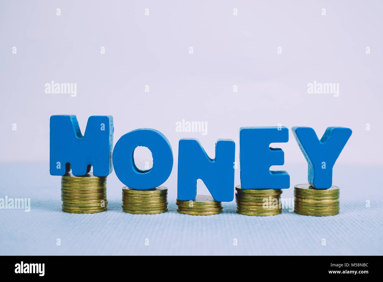 Text MONEY and stack of coin with copy space for add text, motivational ...