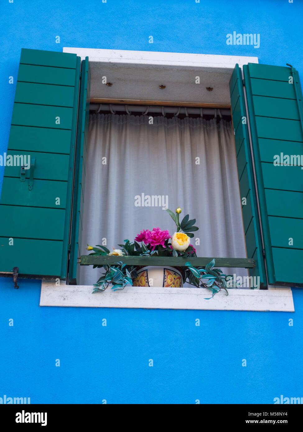 Blue window shutters hi-res stock photography and images - Alamy