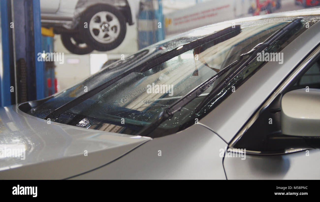 Checking in workshop - working wipers of car, slider shot Stock Photo ...