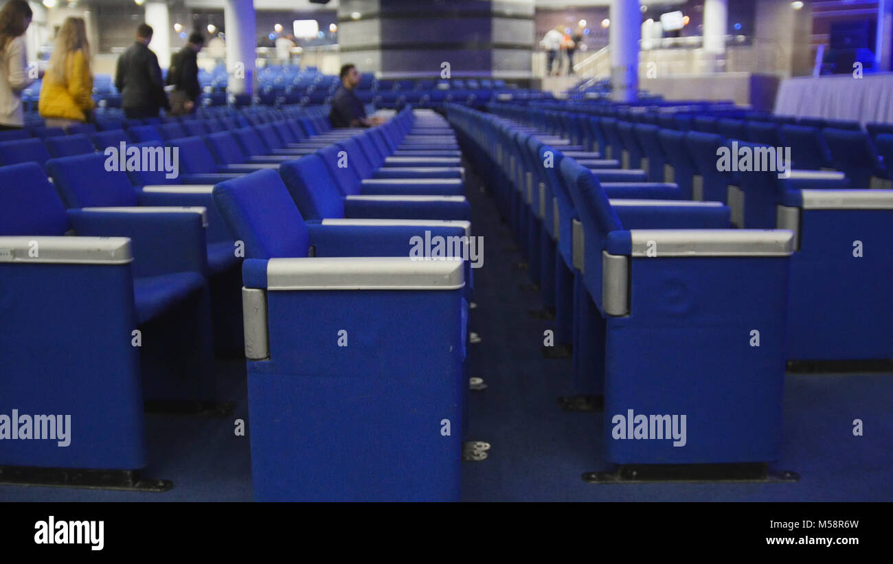 Blue chairs in a concert hall, de-focused Stock Photo - Alamy