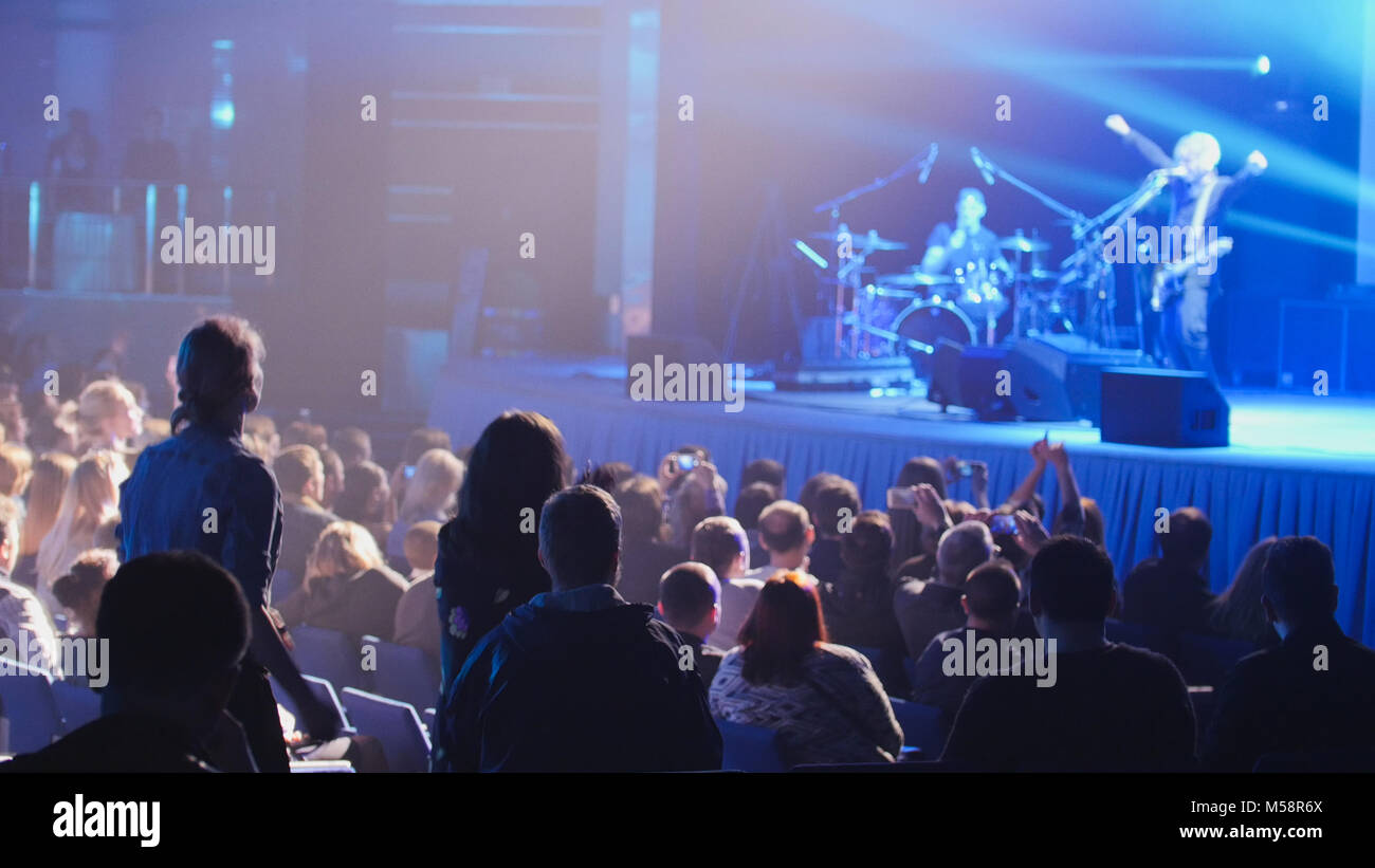 Rock concert - crowd in auditorium listening performance Stock Photo ...