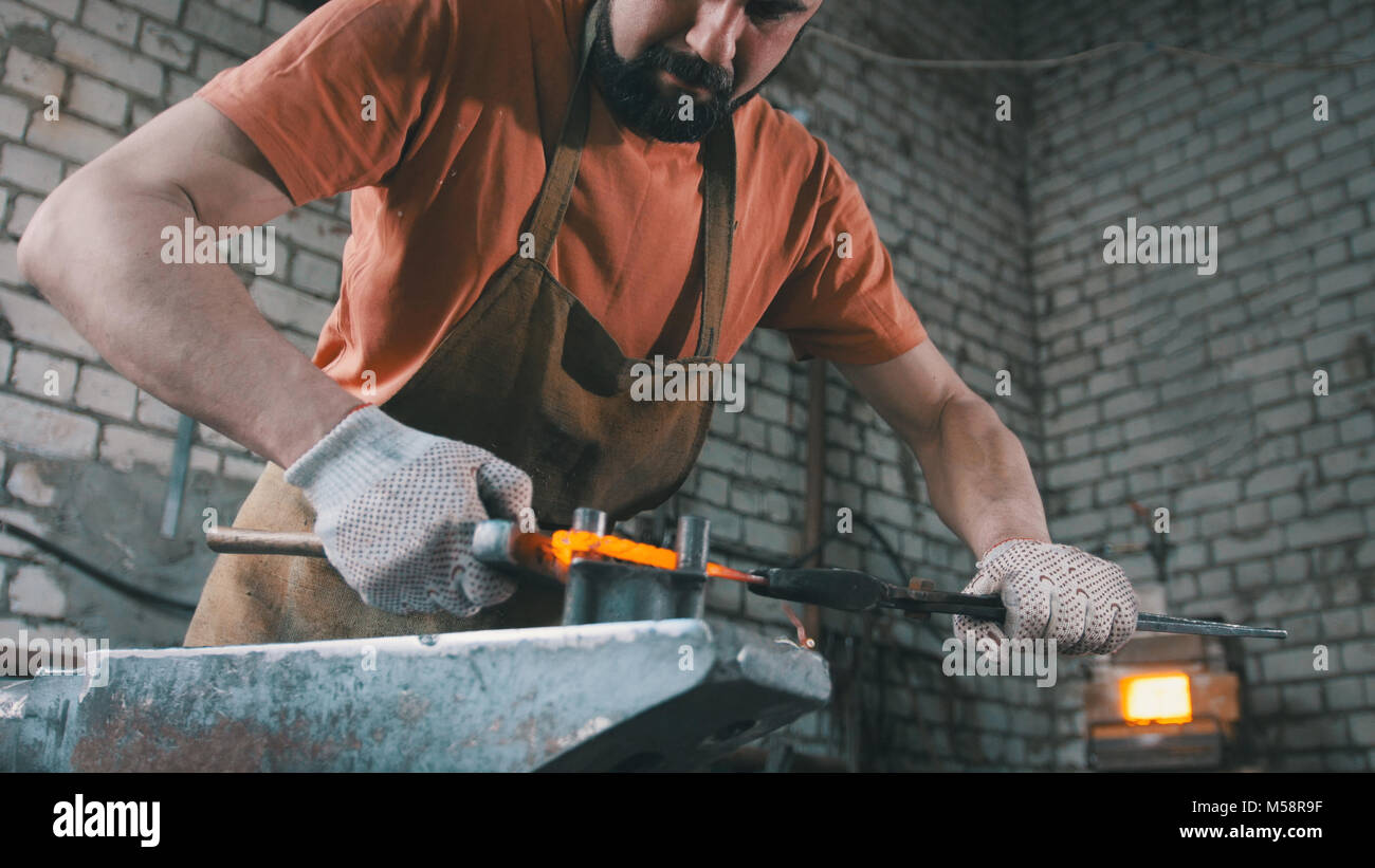 Muscular blacksmith in forge hi-res stock photography and images - Alamy