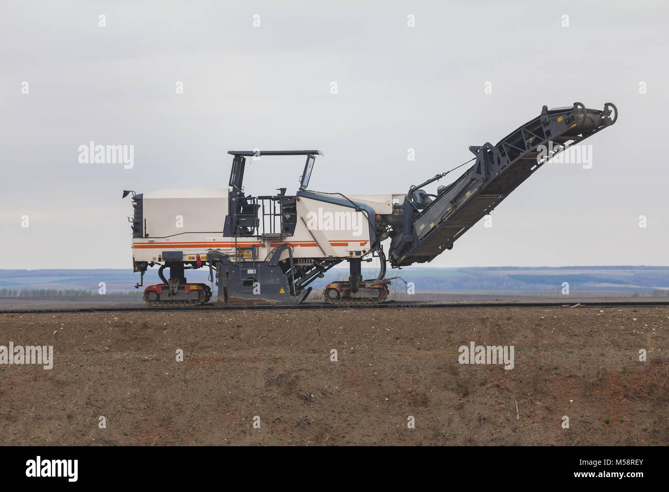 Road construction - asphalt paver machine at highway Stock Photo - Alamy