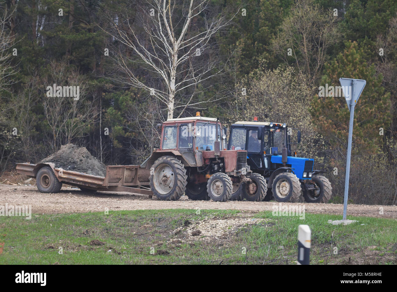 Two tractors at countryside - machinery for agriculture Stock Photo - Alamy