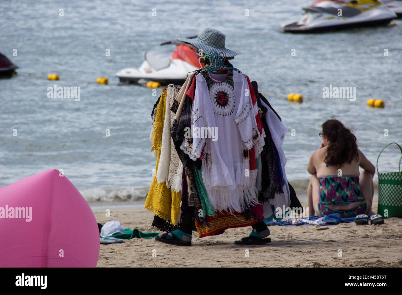 Street / beach seller on Patong beach in Thailand selling clothes Stock ...