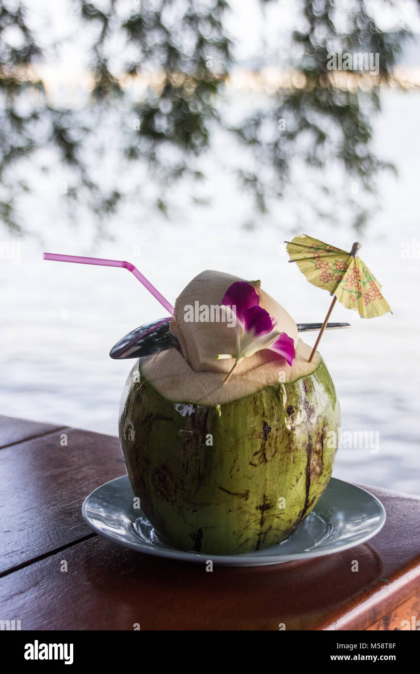 refreshing fresh coconut water drink in Thailand Stock Photo - Alamy