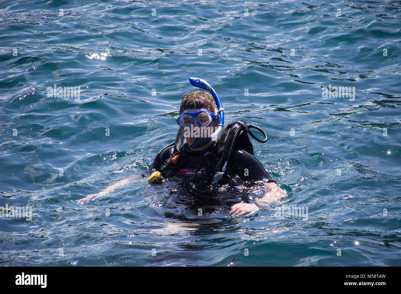 Asian diver with camera hi-res stock photography and images - Alamy