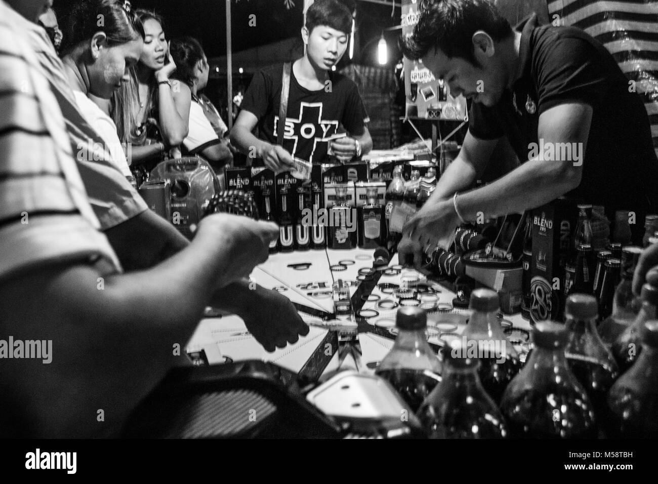 Thai locals socialising at night market in Phuket Stock Photo - Alamy