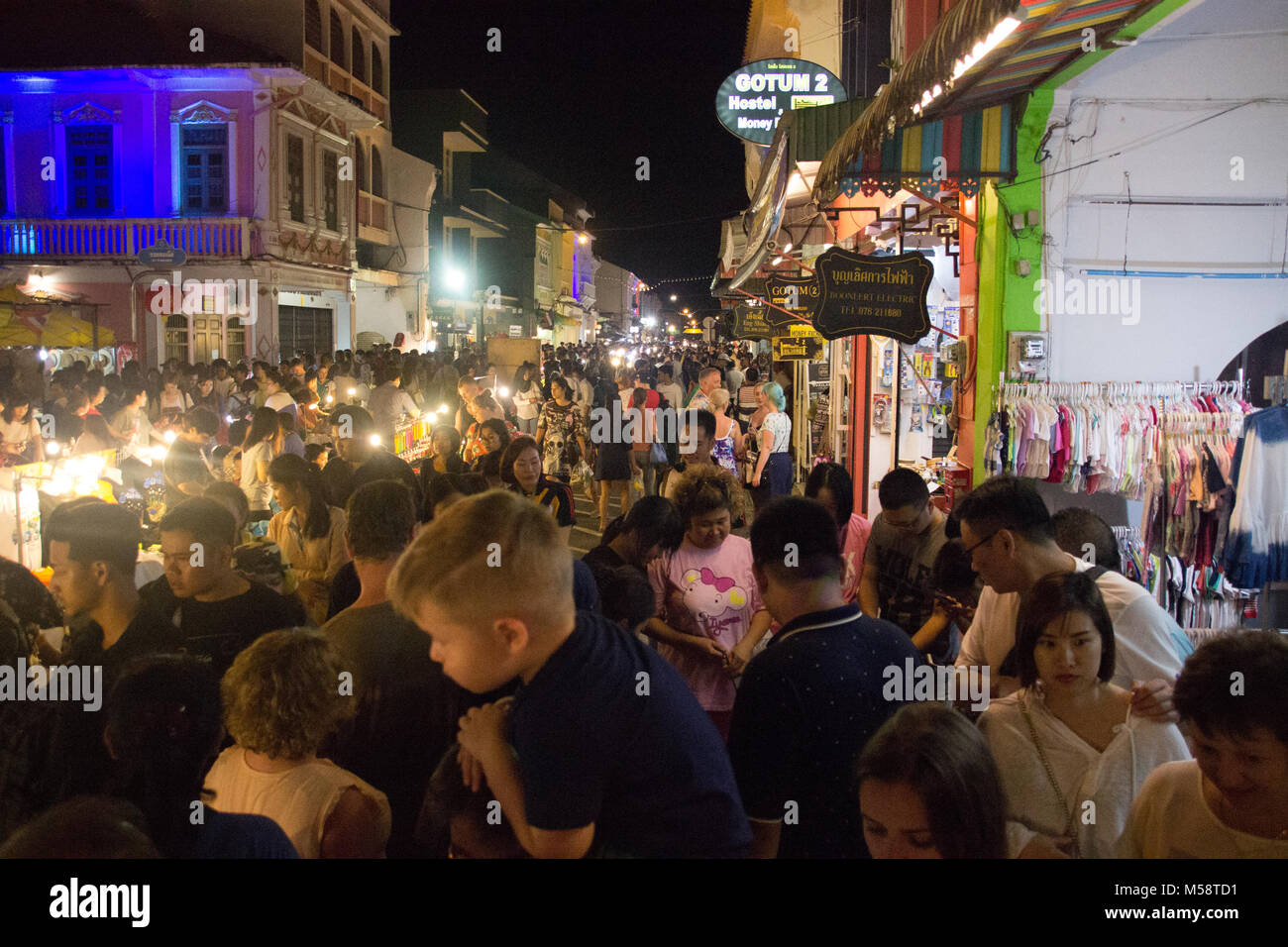 Thai locals socialising at night market in Phuket Stock Photo - Alamy