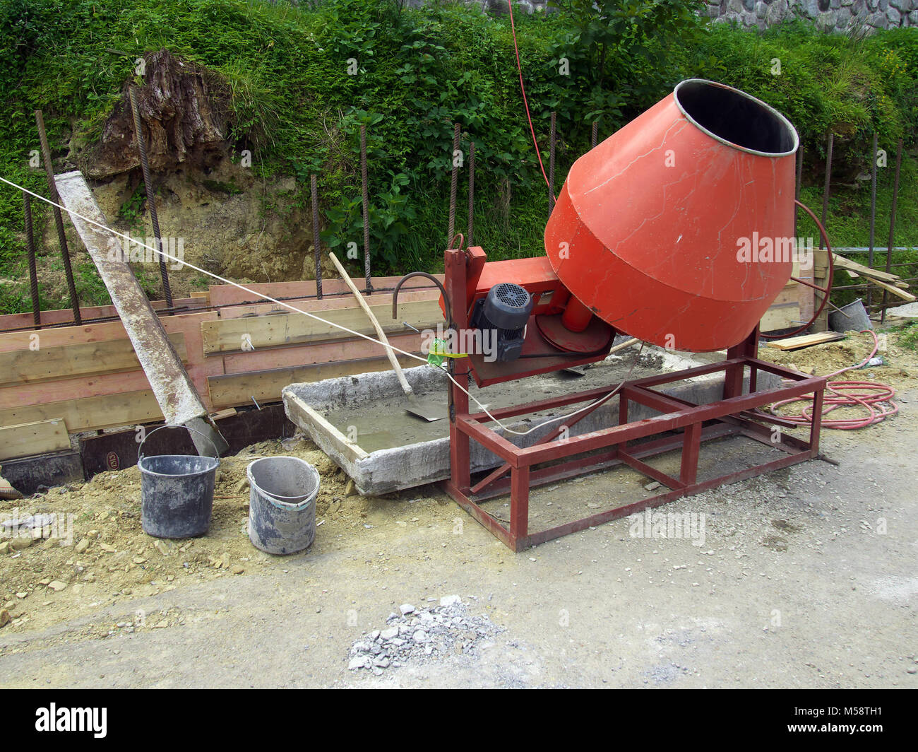 Preparation of the solution using a concrete mixer on a small ...
