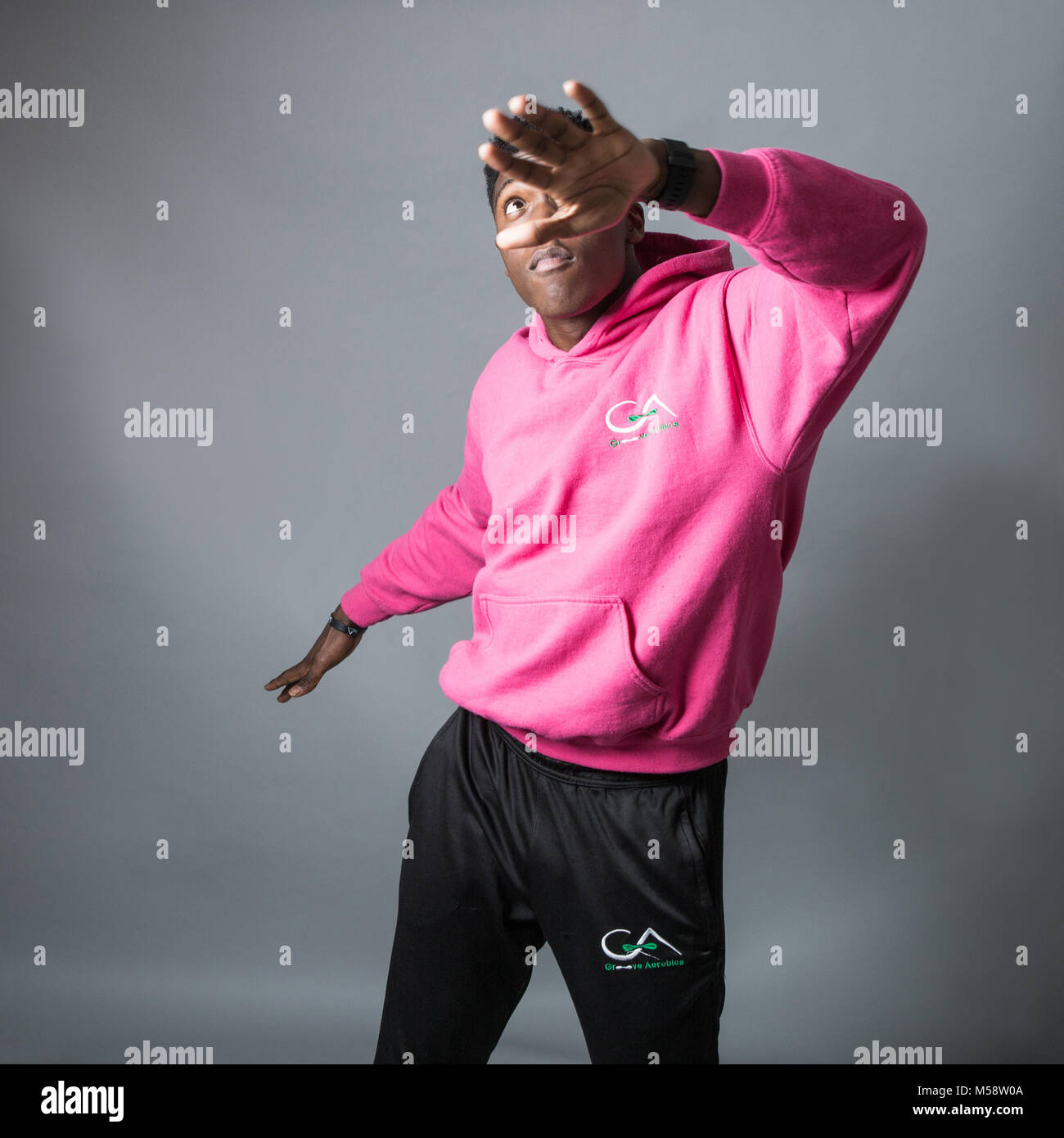 Young black male dancer / fitness instructor shot in studio Stock Photo ...