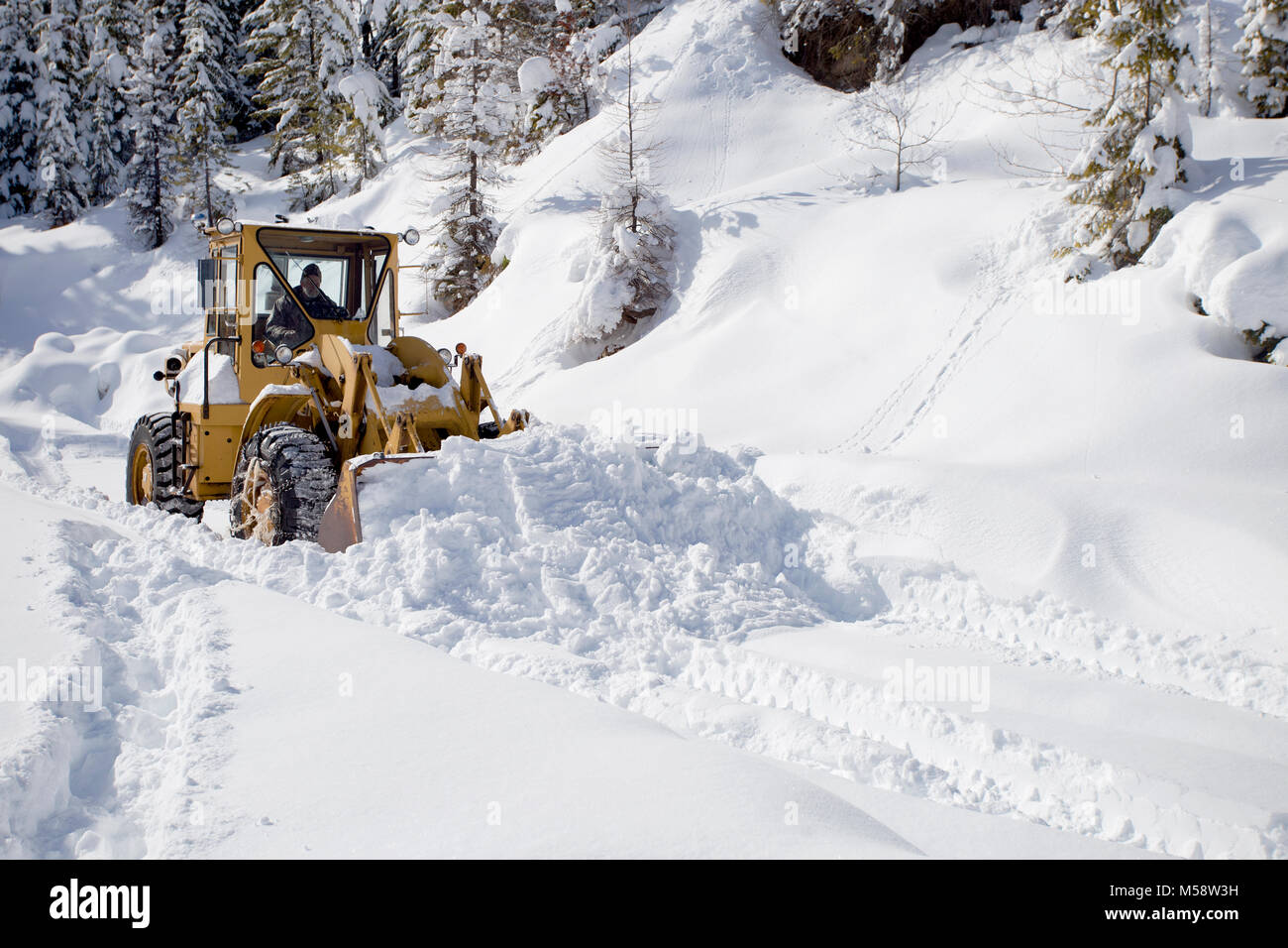 02/19/2018 Snow event. A Caterpillar 950 rubber tired articulated ...