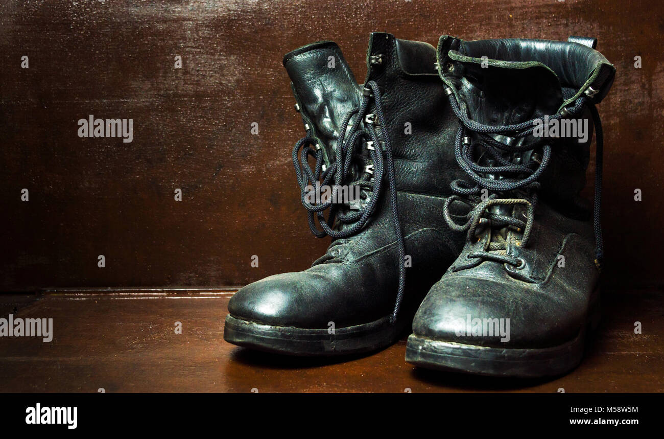 Old worn leather military boots hi-res stock photography and images - Alamy