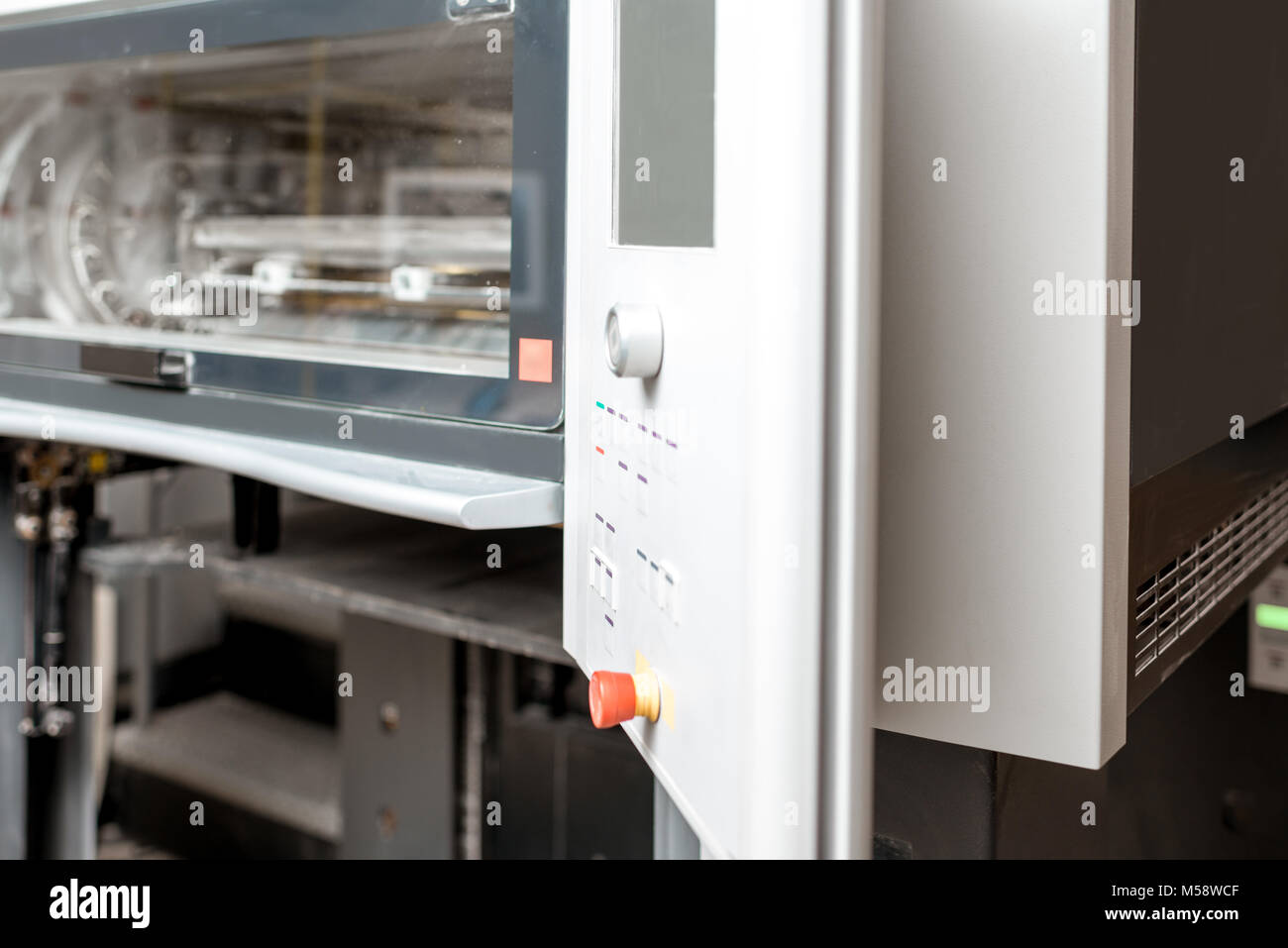Operating part of the offset printing machine Stock Photo - Alamy