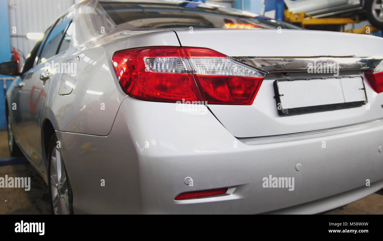 Auto service - back headlights of car Stock Photo - Alamy
