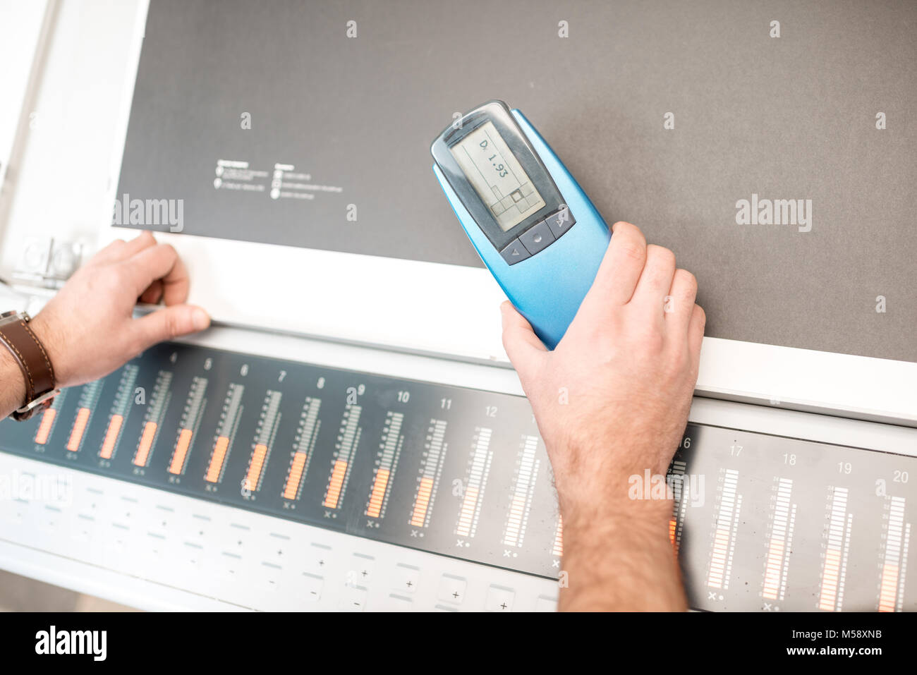 Measuring depth of the black color with spectrometer tool Stock Photo ...