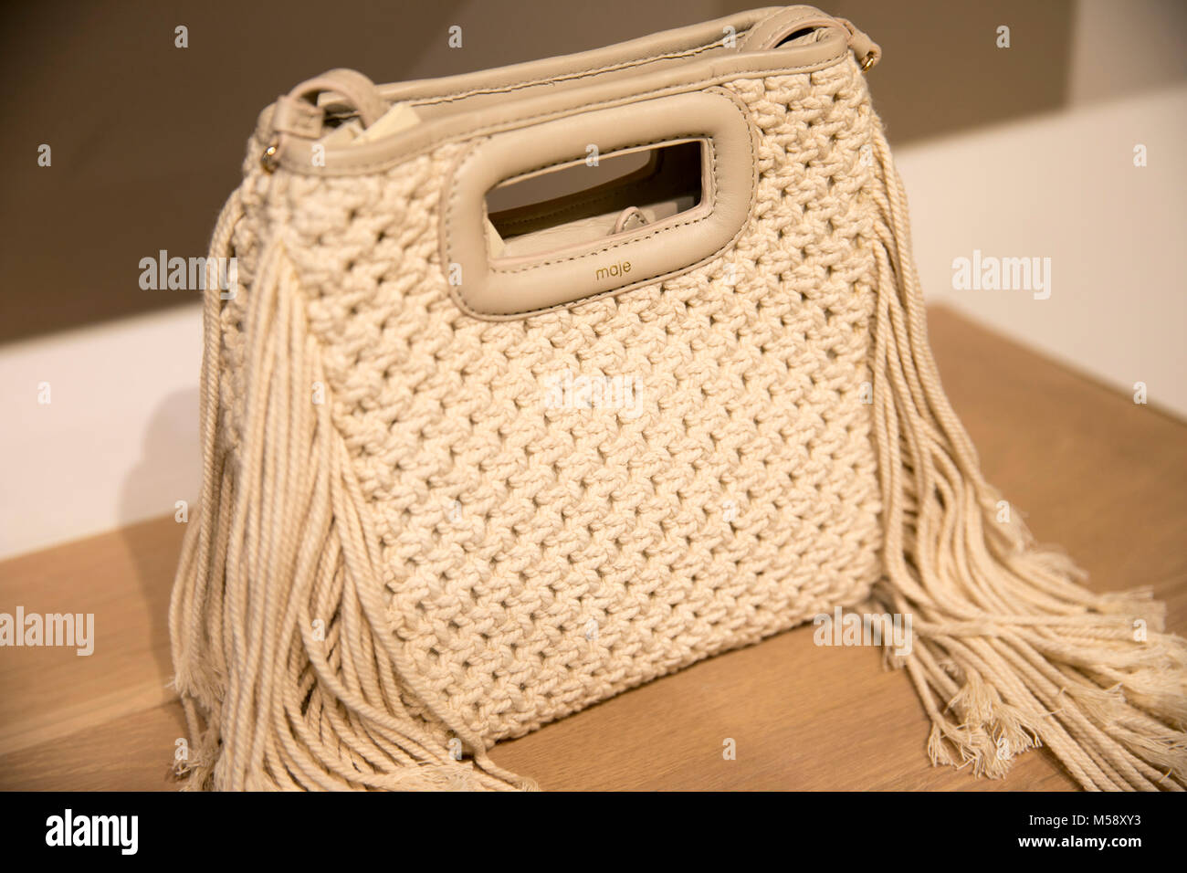 Handbags in shop interior Stock Photo - Alamy