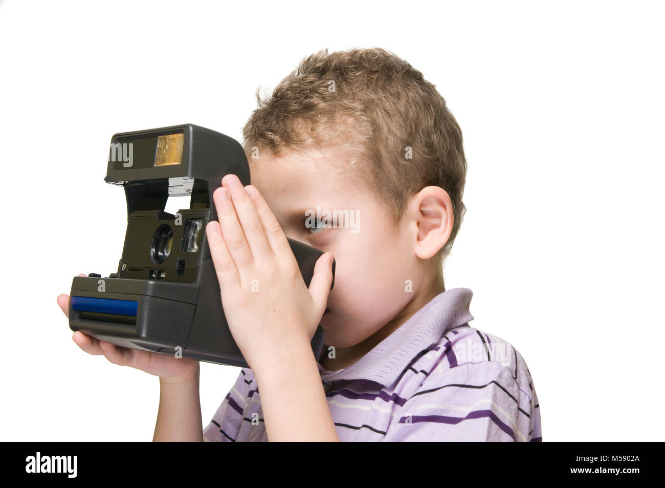 Lateral head-and-shoulder view of a seven-year Caucasian boy through an ...