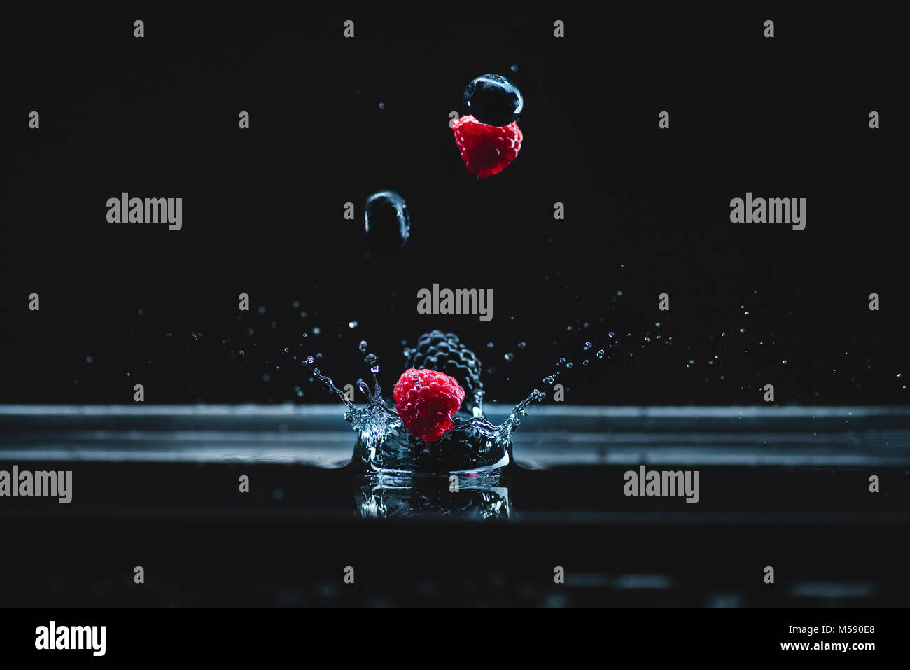 Berries falling water on hi-res stock photography and images - Alamy