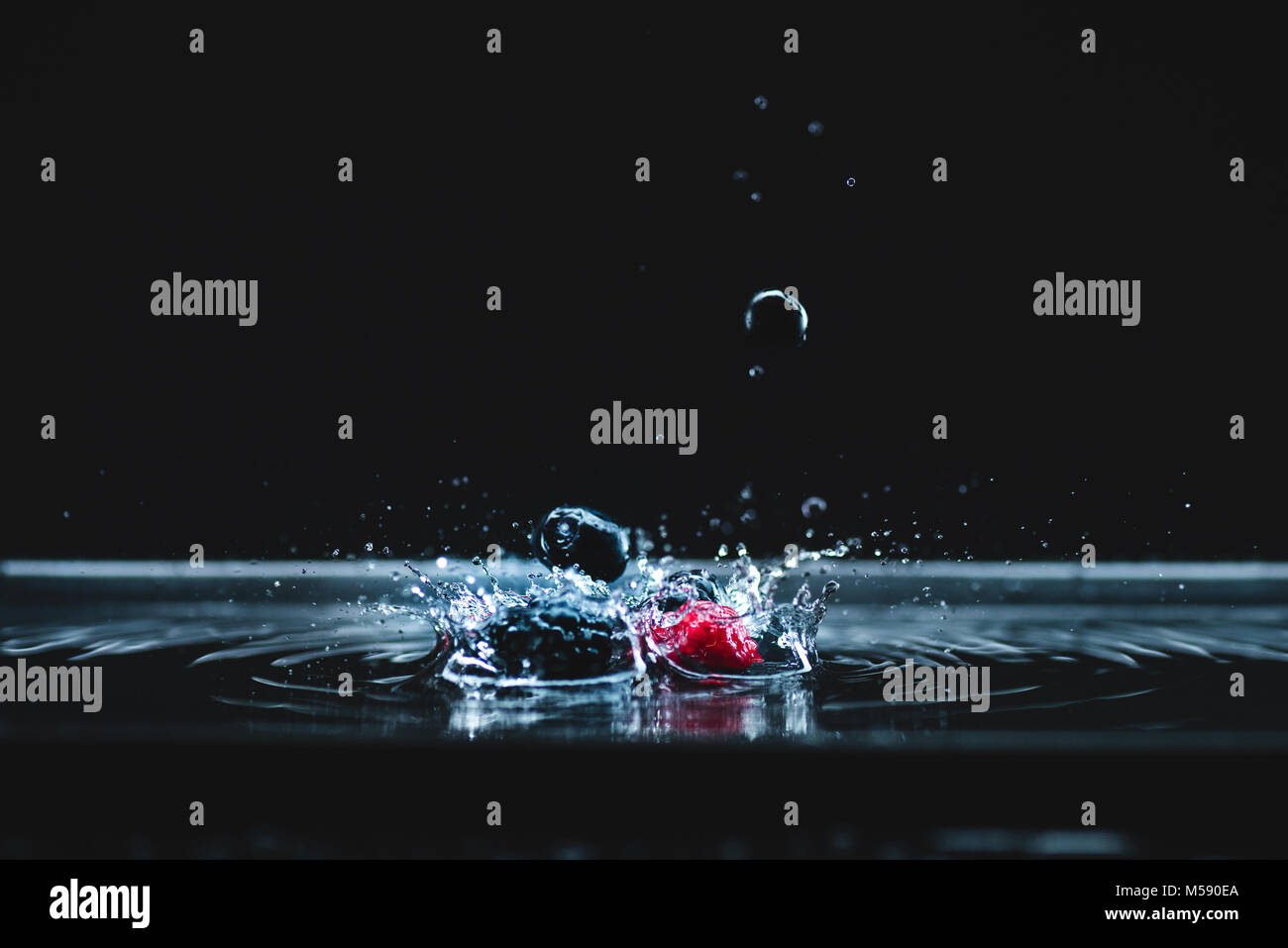 Berries falling water on hi-res stock photography and images - Alamy