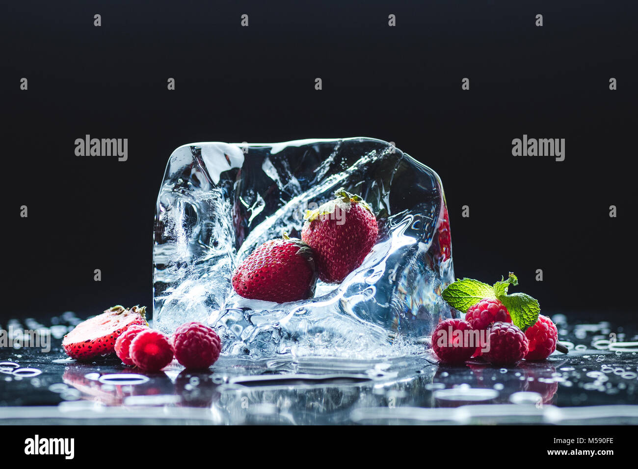 Strawberries with melting ice hi-res stock photography and images - Alamy