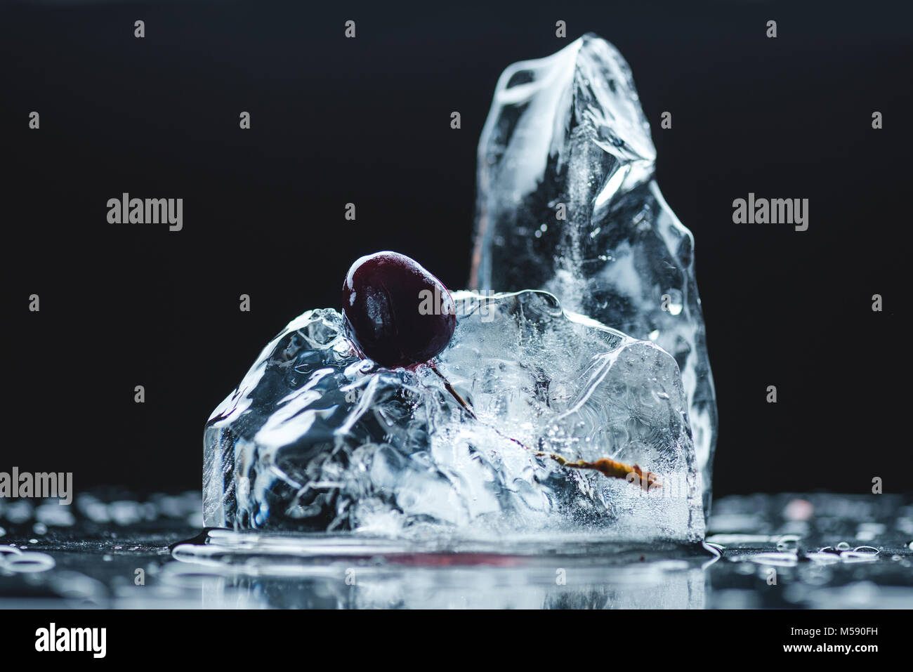 Cherry in ice cube hi-res stock photography and images - Alamy