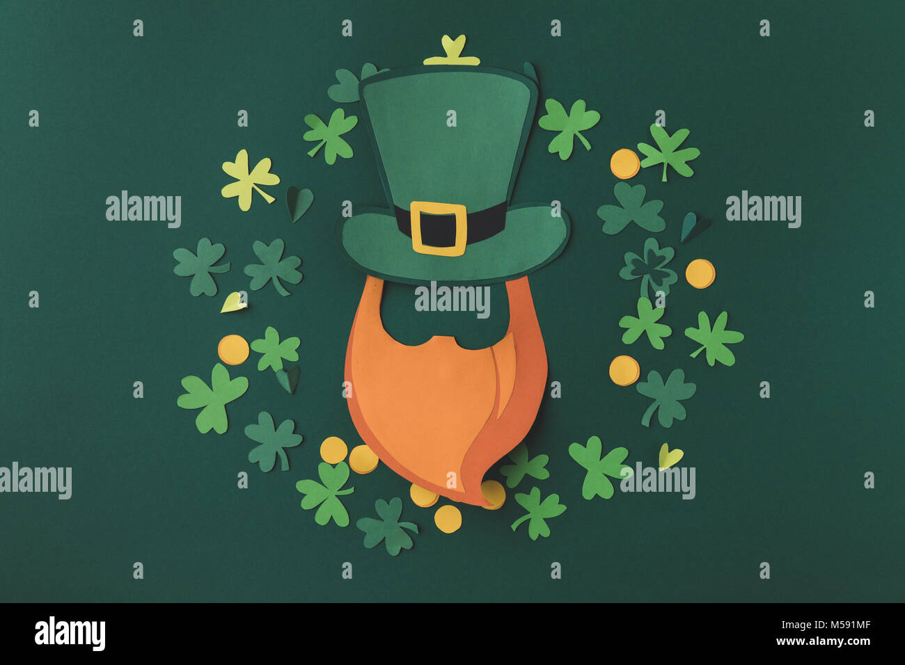 top view of paper decoration for st patricks day isolated on green ...