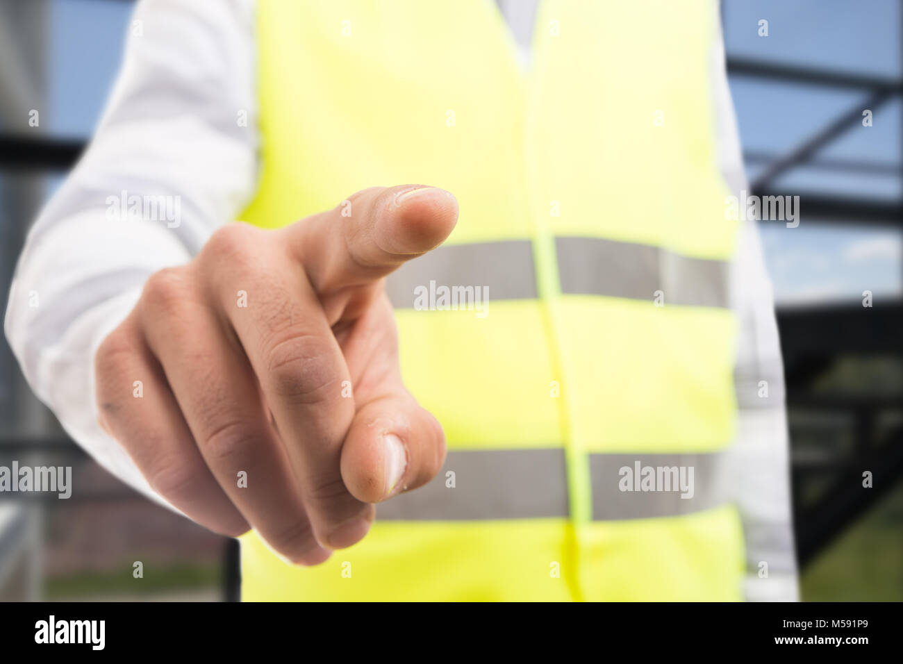 Engineer touching invisible transparent screen display with index ...