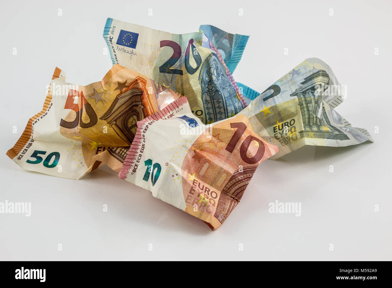 Euro banknotes and white background Stock Photo - Alamy