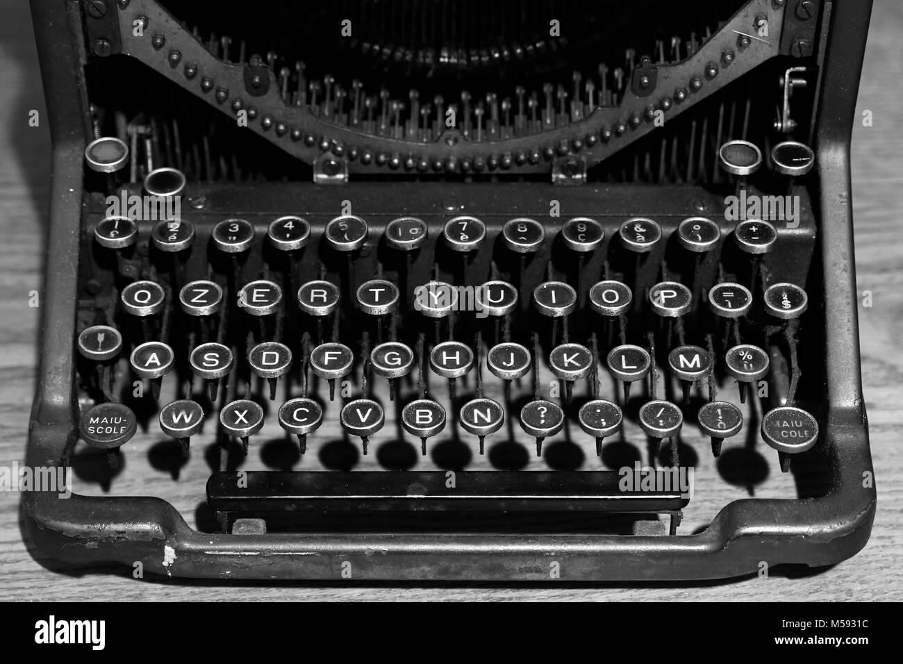 Old typewriter photographed from the front, you see the letter keys ...
