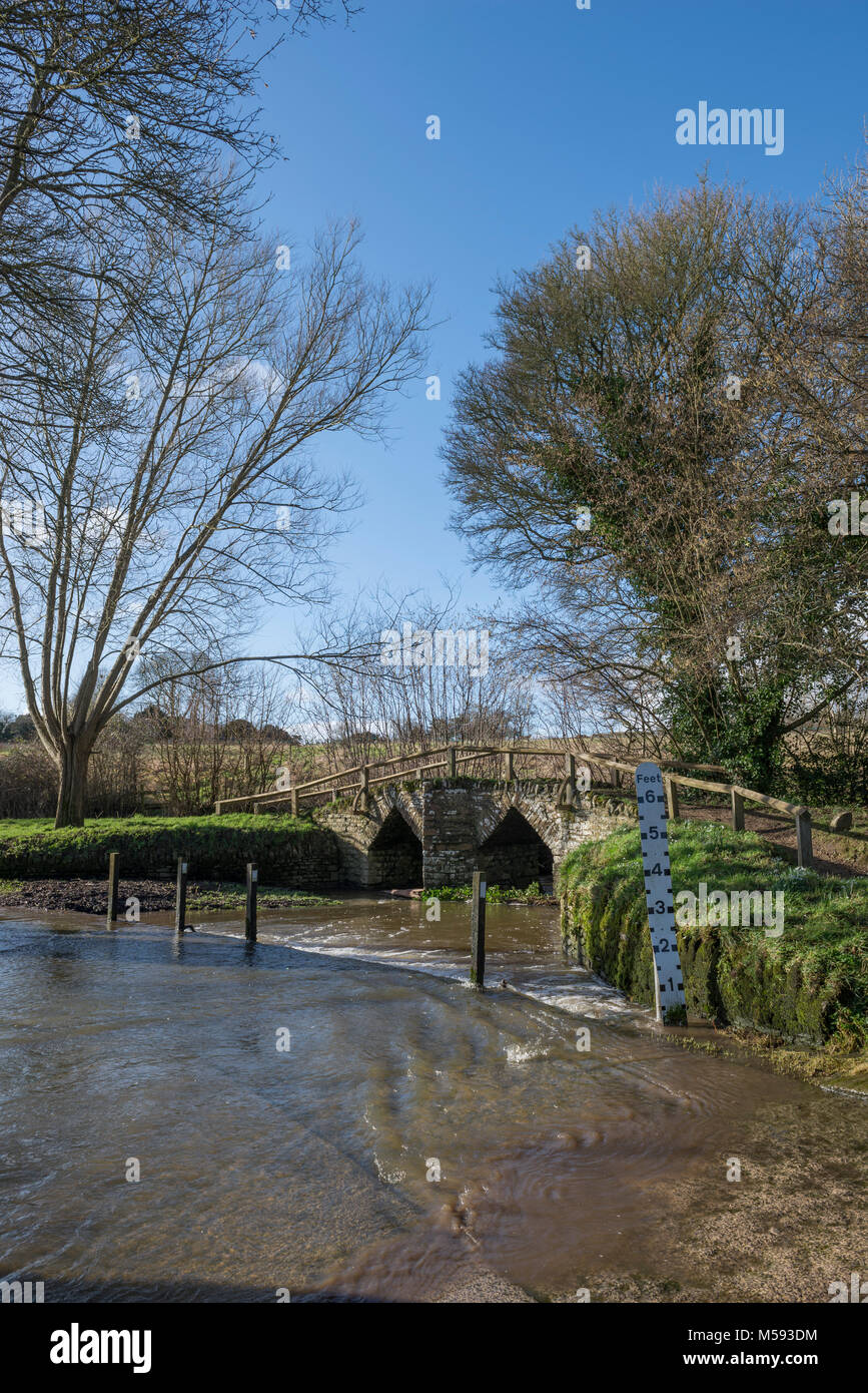 The medieval packhorse bridge and ford in Fifehead Neville, Dorset, UK ...
