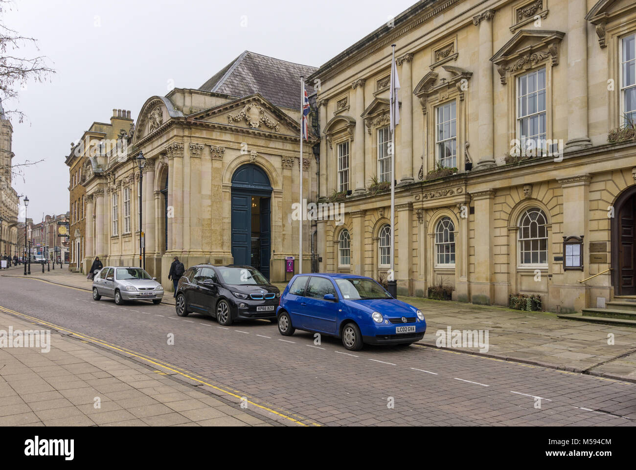 Two historic buildings in Northampton, UK; on the left the Sessions ...