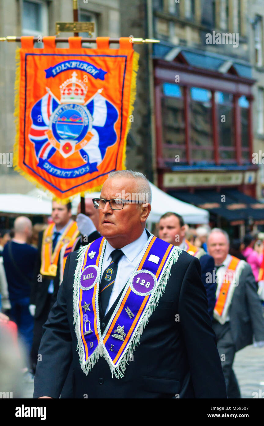 Male member of The Orange Order during the procession up the Royal Mile ...