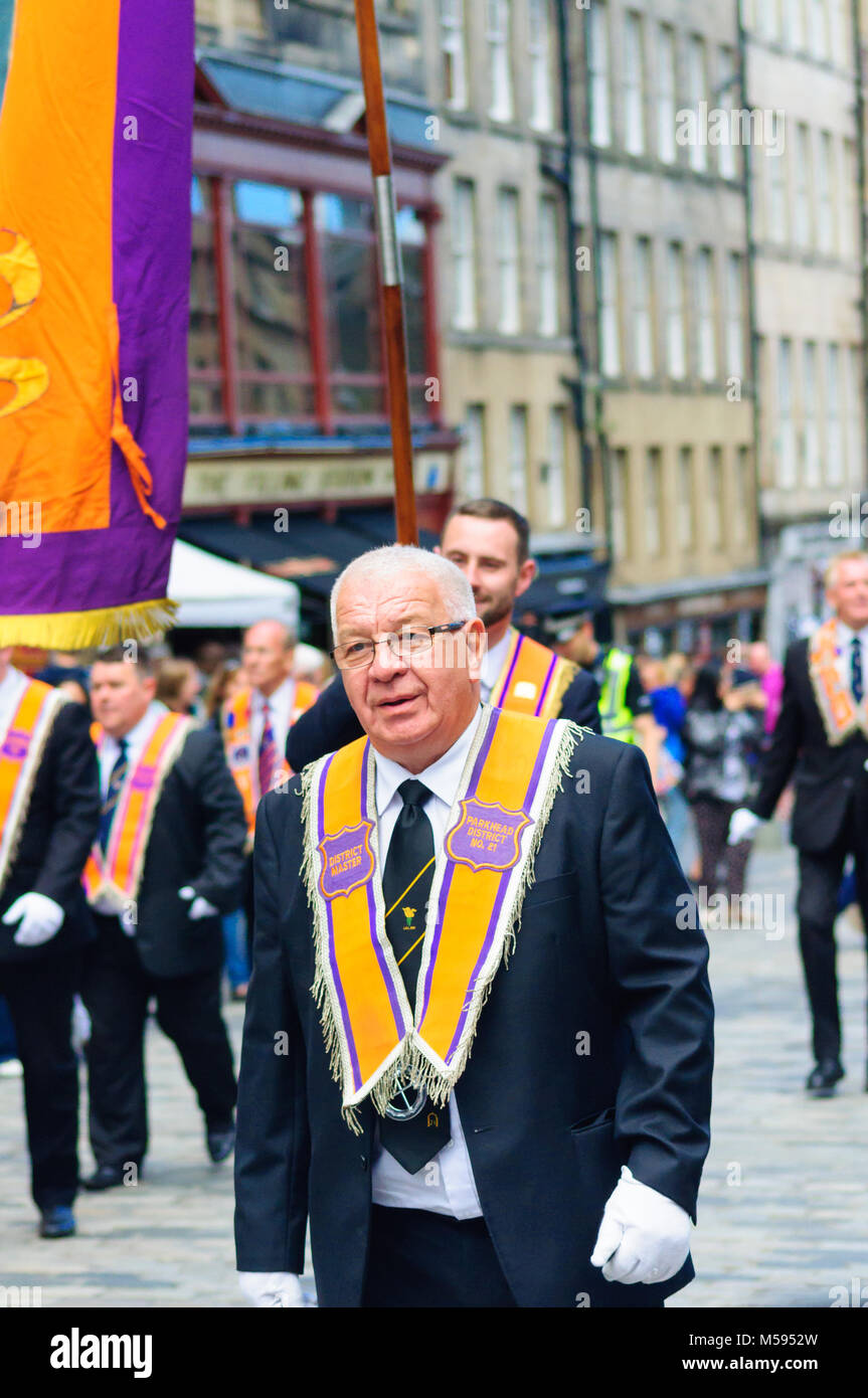 Male member of The Orange Order during the procession up the Royal Mile ...