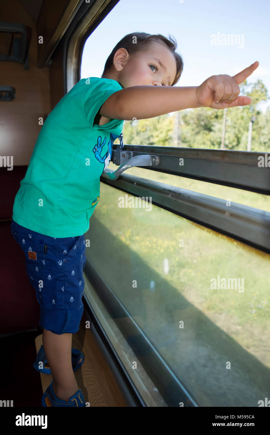Excited child window hi-res stock photography and images - Alamy