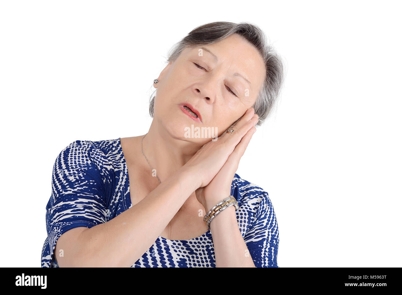 Portrait of senior woman falling asleep. Isolated white background ...
