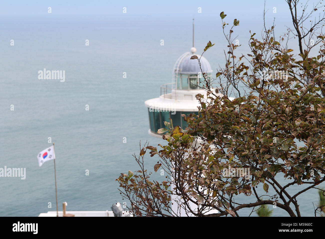 Yeongdo Lighthouse with the Korea flag at Taejongdae park, Busan, South ...