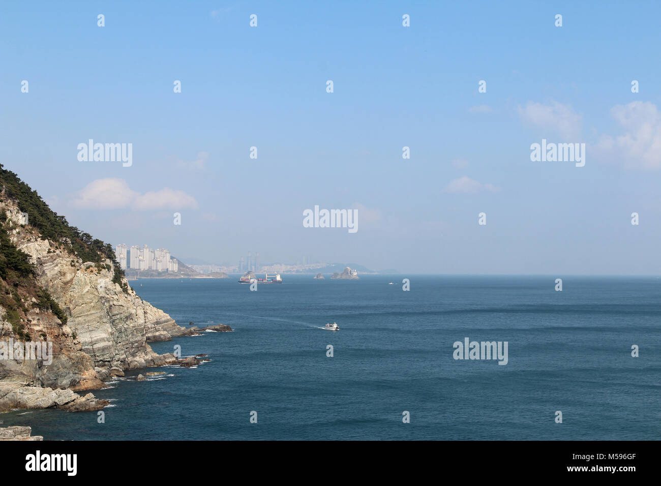 Rocky coastline and magnificent cliffs at Taejongdae recreational park ...