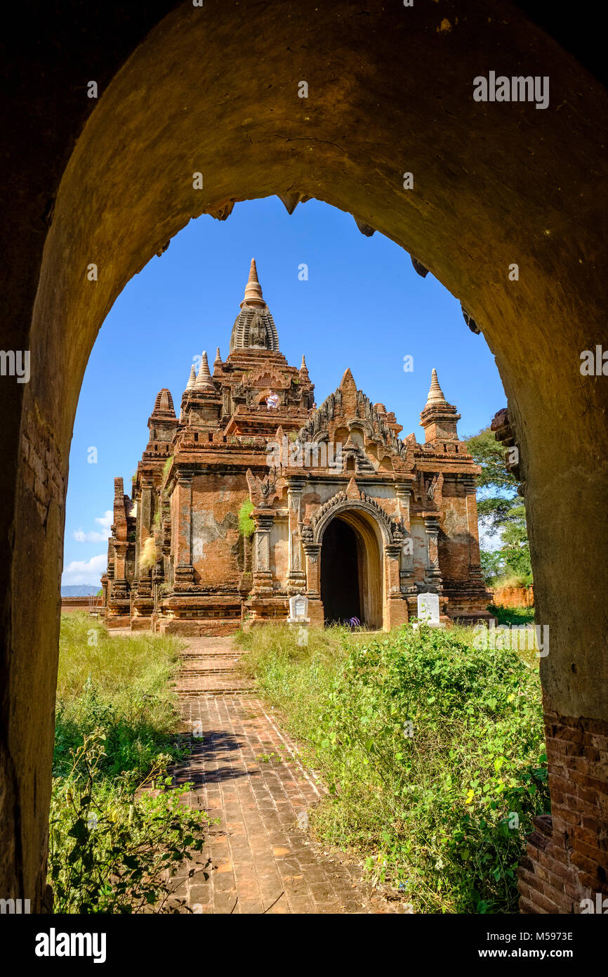 Pagodas of Bagan in the plains of the archaeological site, seen through ...