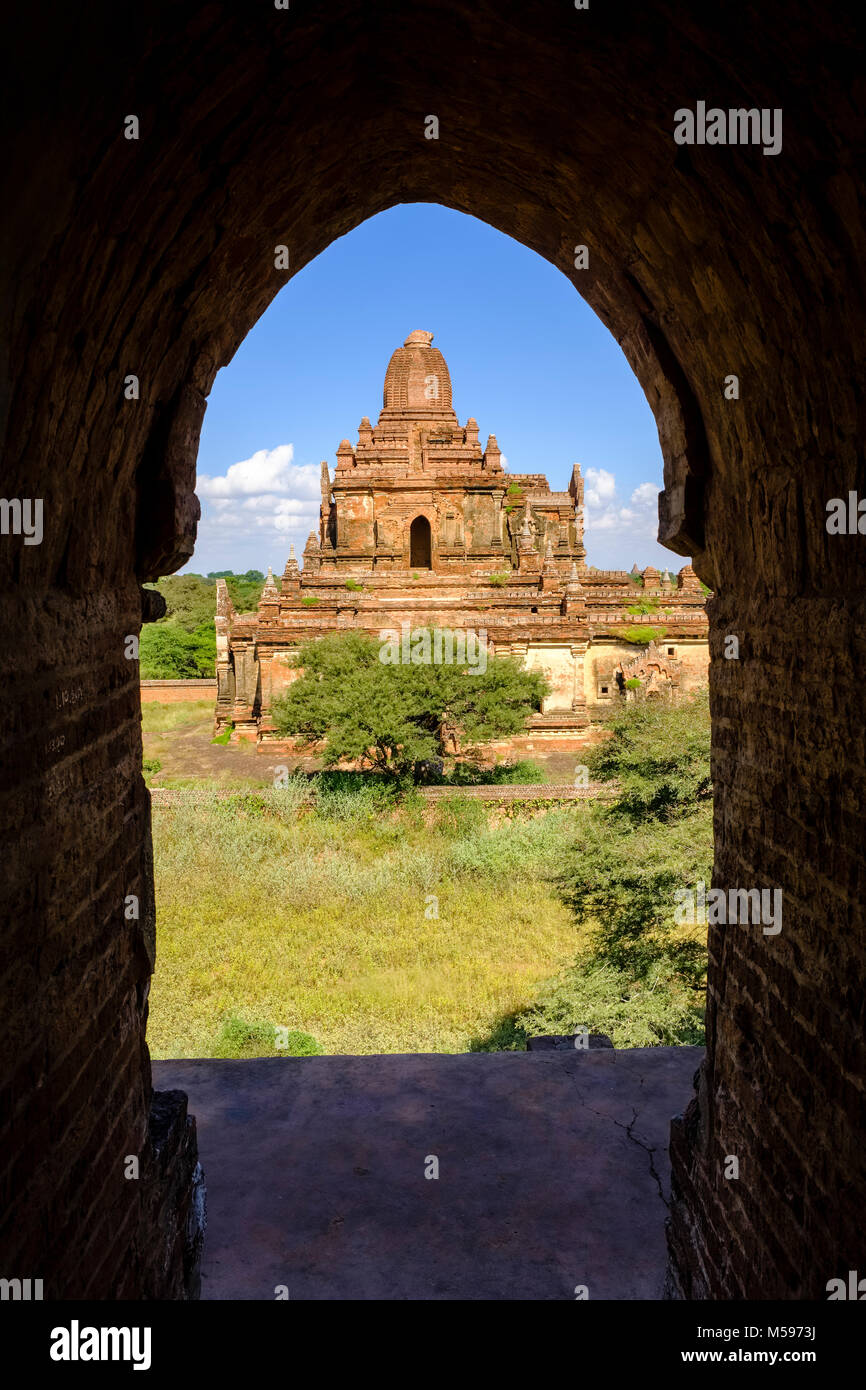 Pagodas of Bagan in the plains of the archaeological site, seen through ...